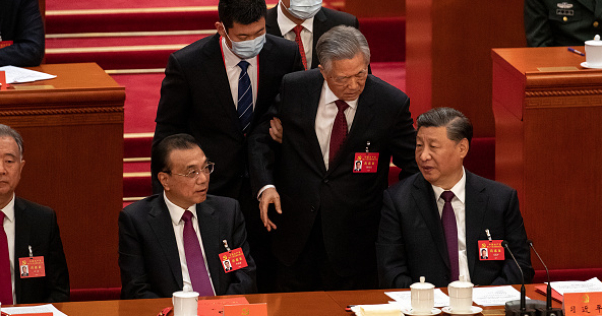 In China, the removing of the former leader Hu Jintao from the hall was ...